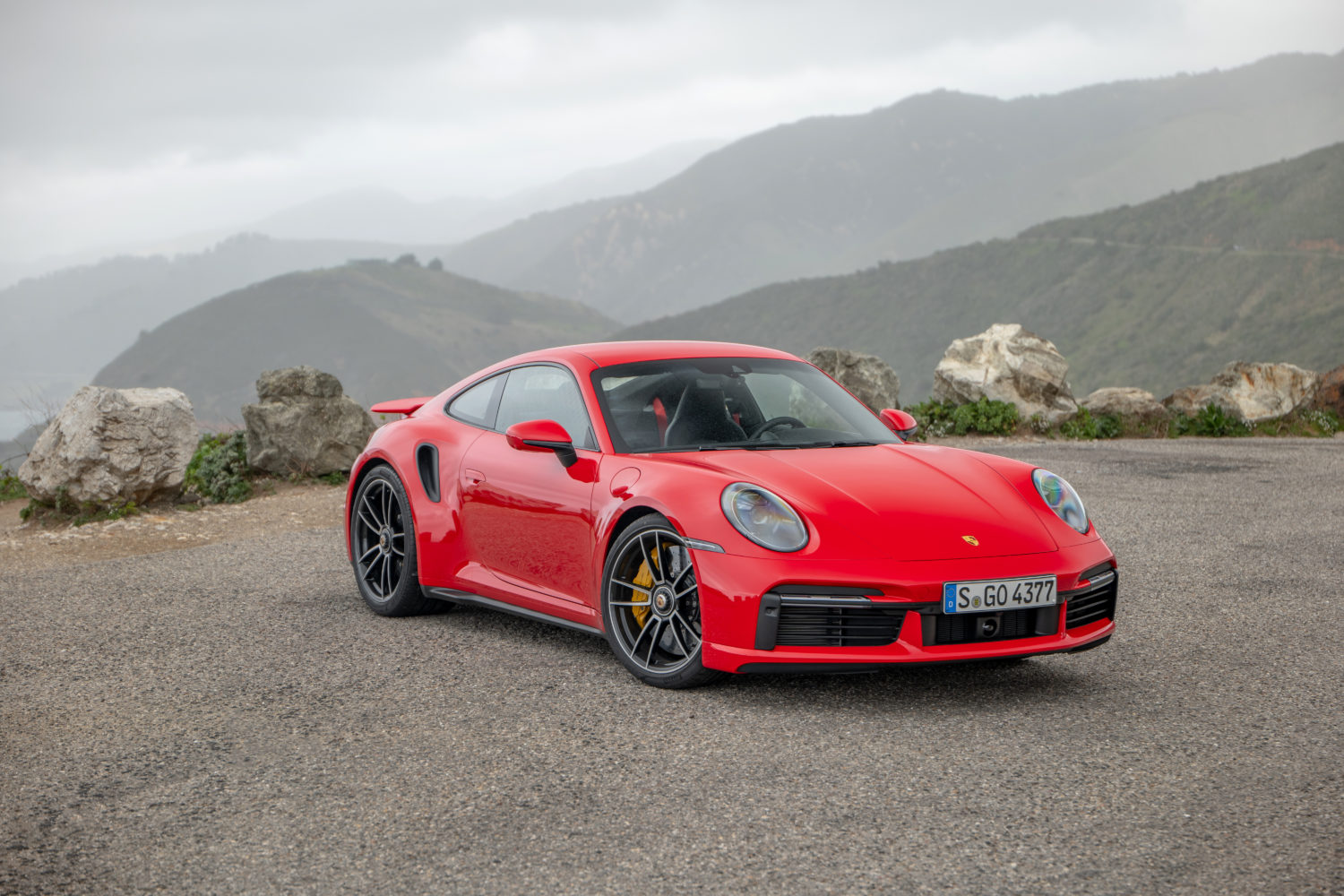 Watch the New Porsche 911 Turbo S Destroy Hypercars | eCarGuides